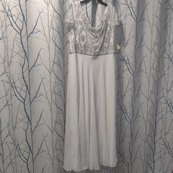 J Kara | Dresses | J Kara Ivory Beaded Empire Cowl Flutter Sleeve ...
